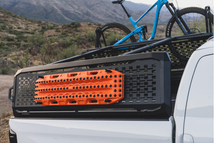 Meet the IBEX™ from Küat. This is the sandy black mid-size short bed ...